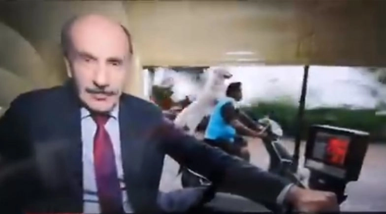 Dog Riding Pillion Photobombs BBC Reporter in India, Hilarious Video ...