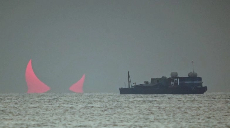 Red ‘Devil Horns’ Sunrise Over Persian Gulf During Annular Solar ...