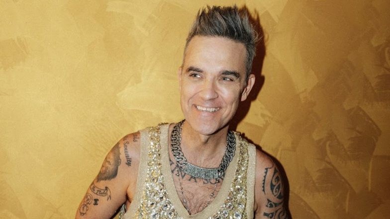 Robbie Williams Speaks on Years of Self-Doubt and Imposter Syndrome, 49 ...