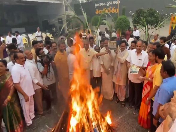 India News | TDP Cadre Celebrate Bhogi in Vijayawada, Burn Posters of ...