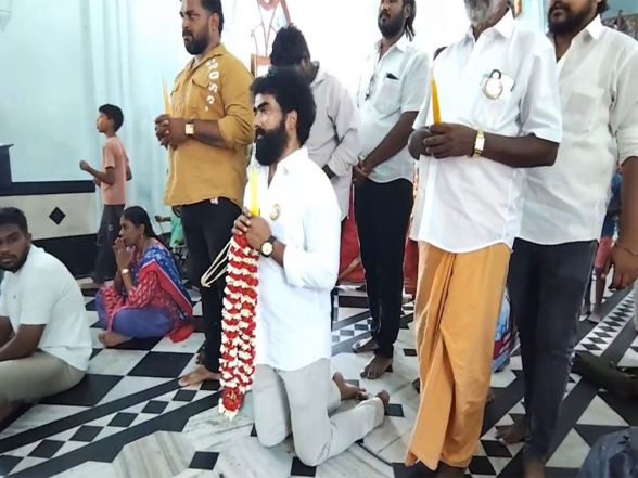 India News | TVK Functionary Fulfils Vow at Church by Walking on Knees ...